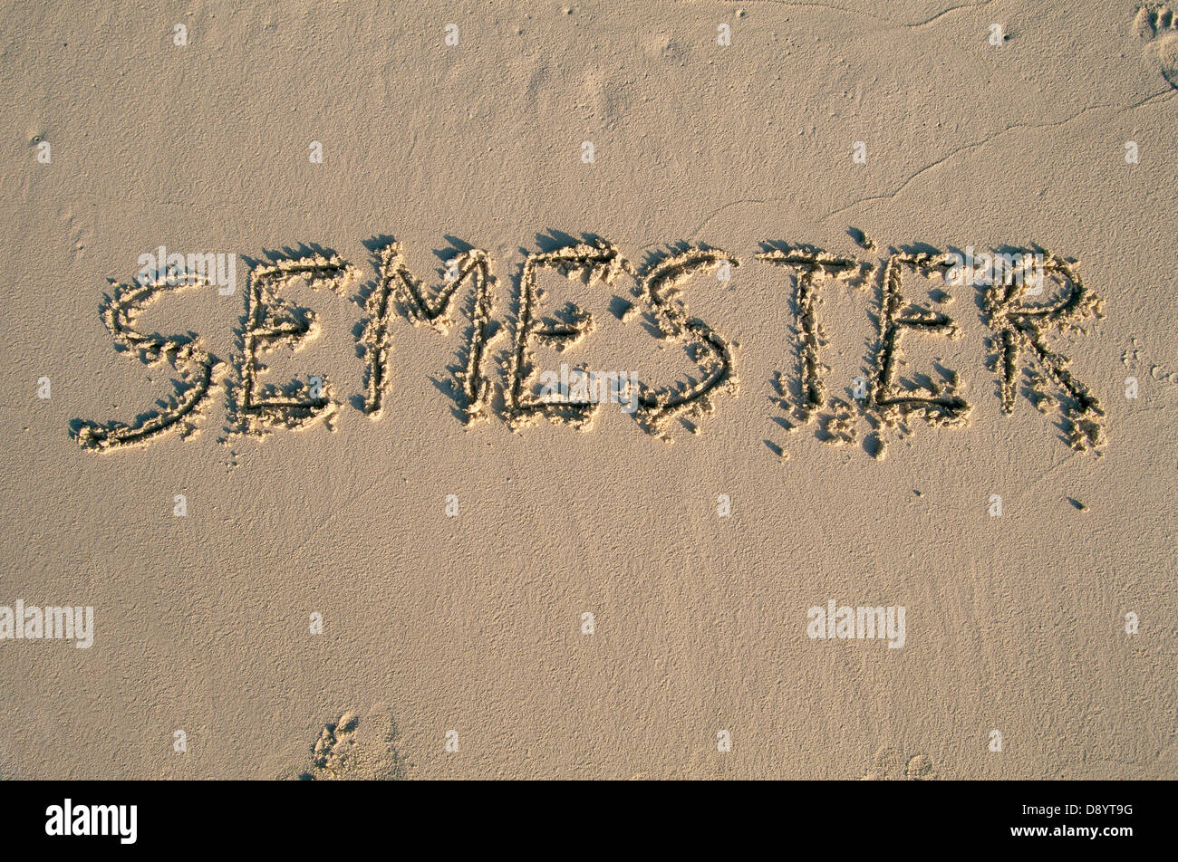 Semester written in sand Stock Photo - Alamy