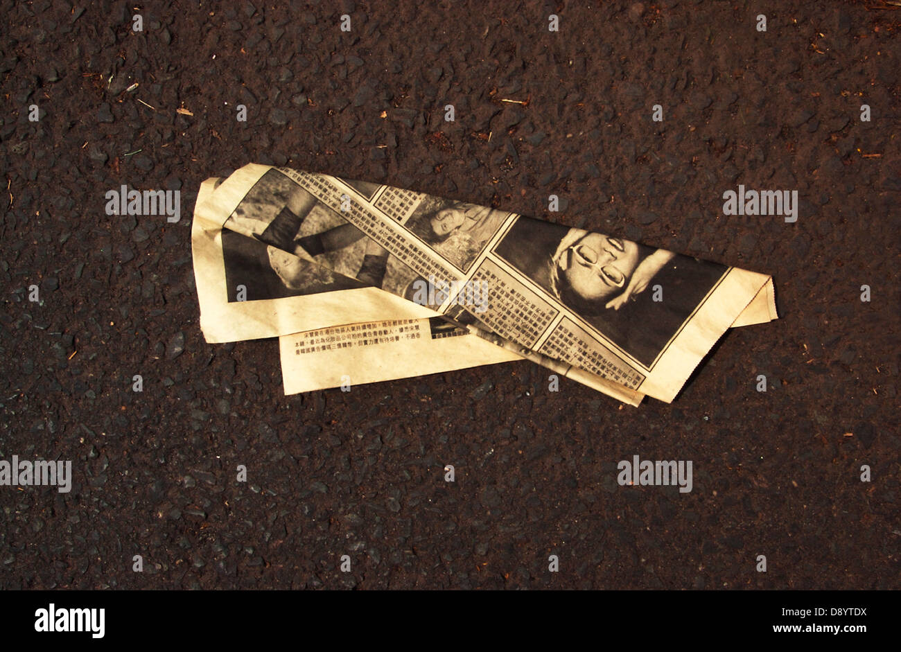 A newspaper on the ground, USA Stock Photo - Alamy