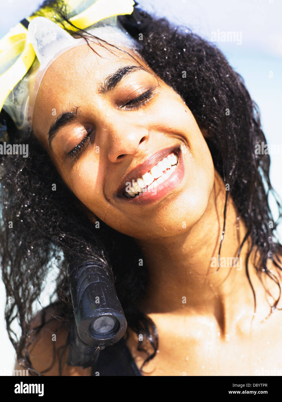 A woman with a snorkel and diving mask Stock Photo - Alamy