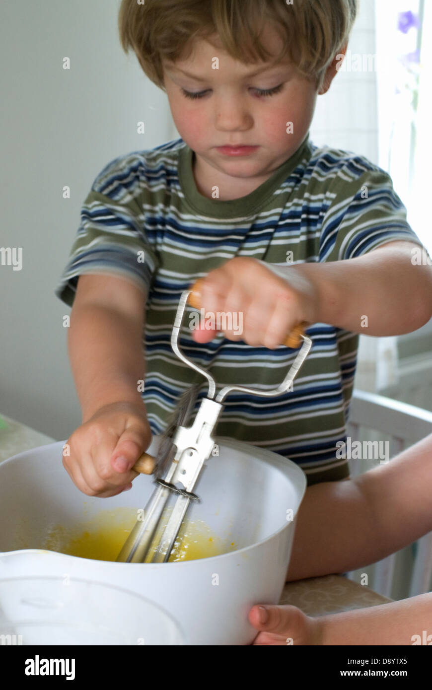 A boy baking, Sweden Stock Photo - Alamy