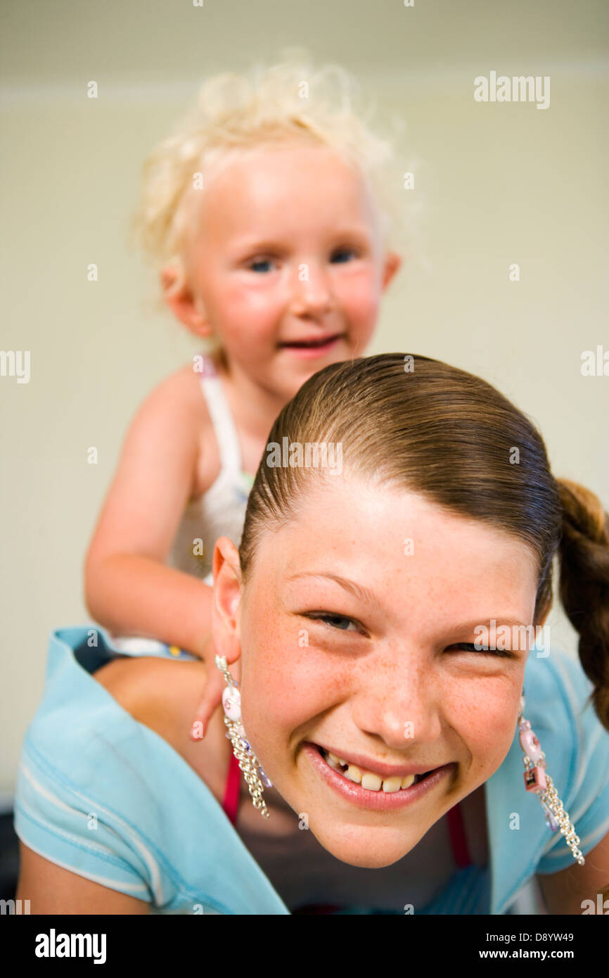 Portrait of two happy sisters Stock Photo - Alamy