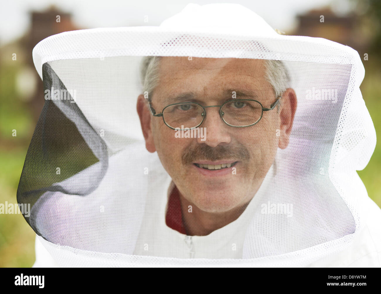 Portrait of a bee-keeper Stock Photo - Alamy