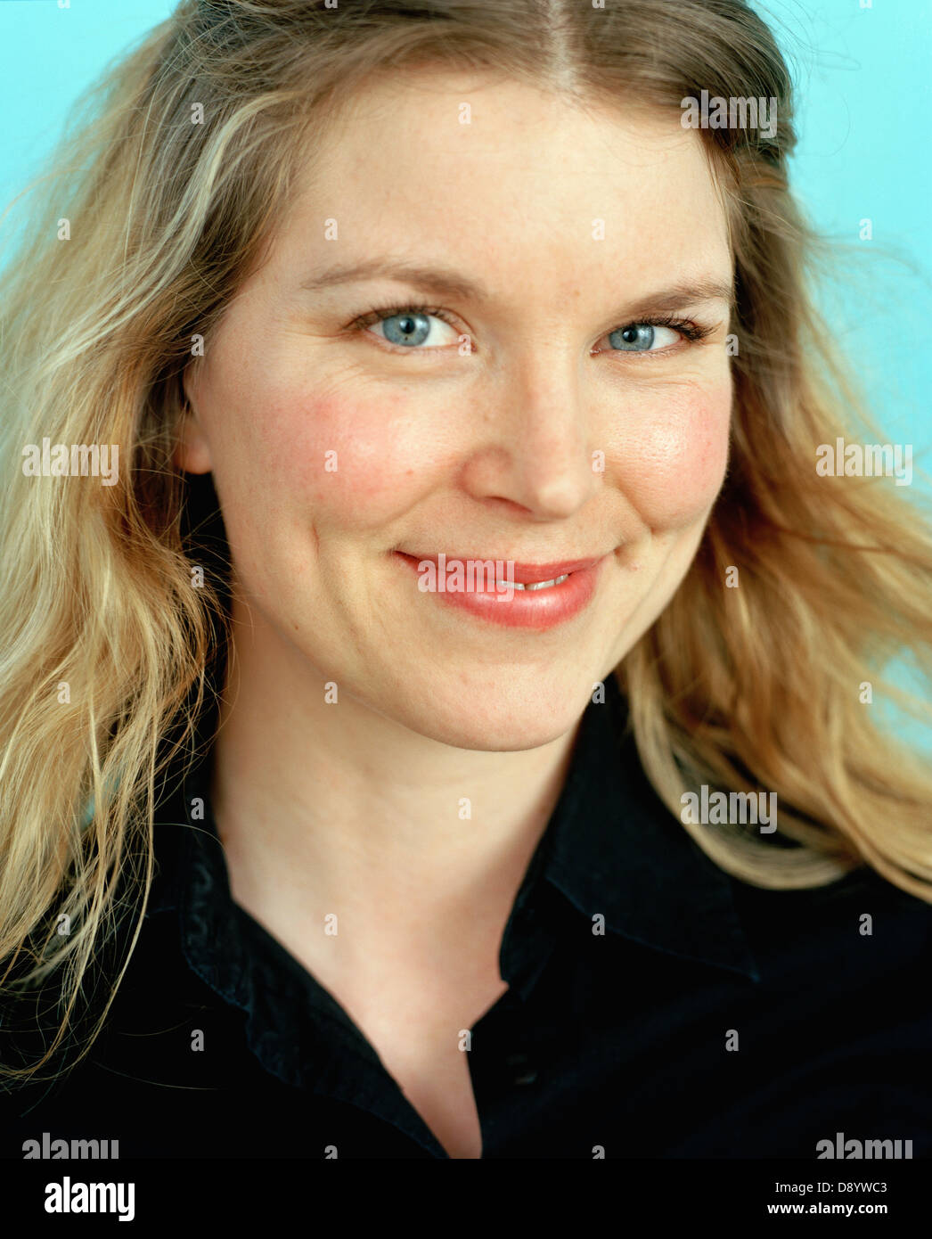 Portrait of a smiling woman Stock Photo - Alamy