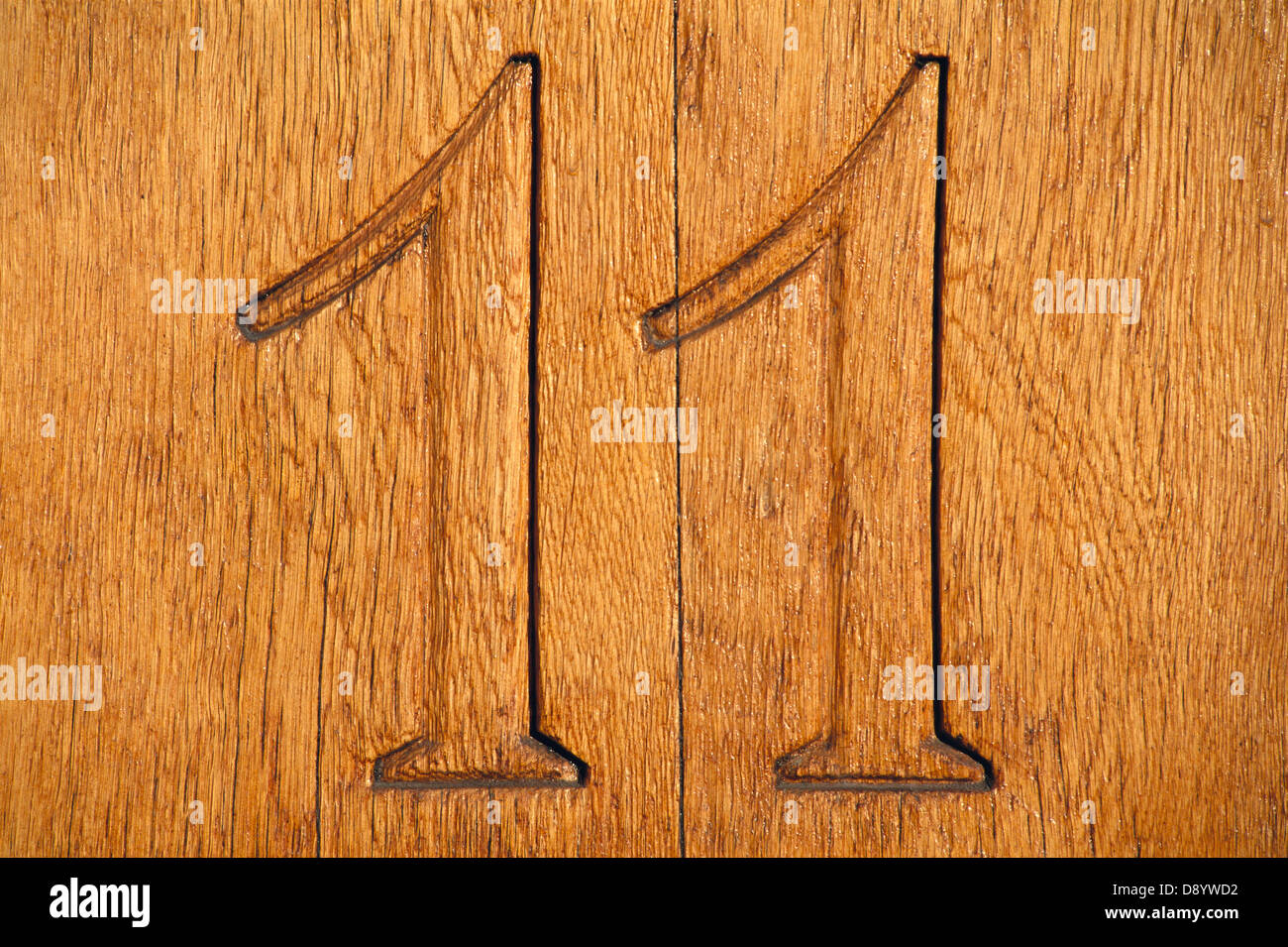 Two ones on wood Stock Photo - Alamy