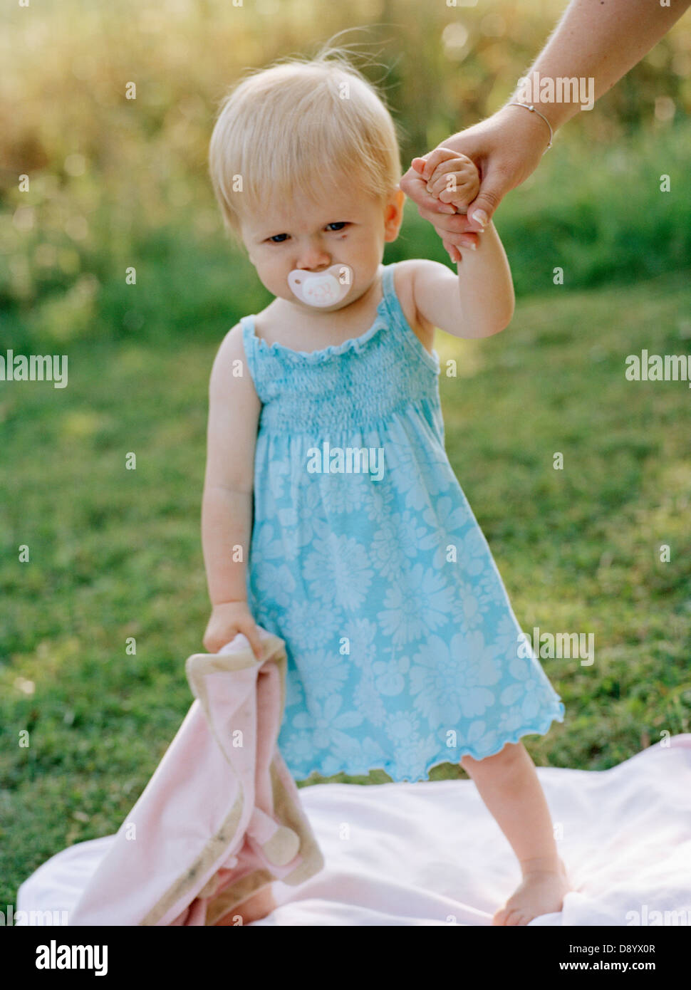 A little girl with a comforter, Sweden Stock Photo - Alamy