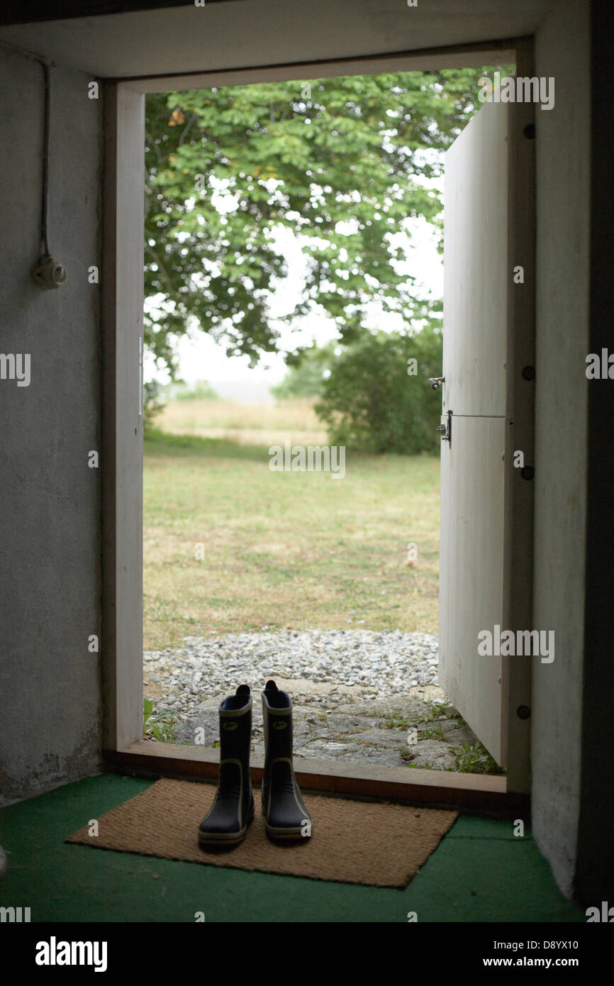 A pair of boots ina hall Stock Photo - Alamy