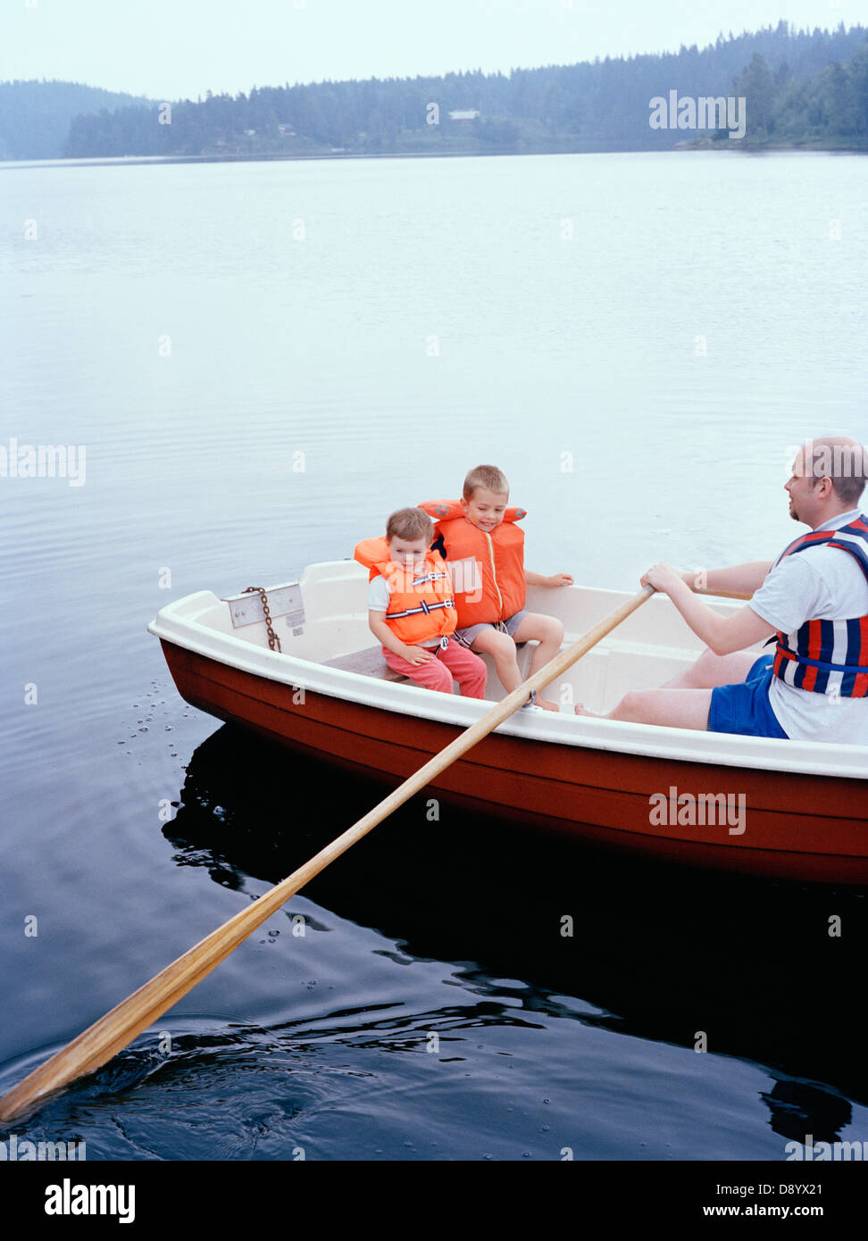 Two children on a rowing boat hi-res stock photography and images - Alamy