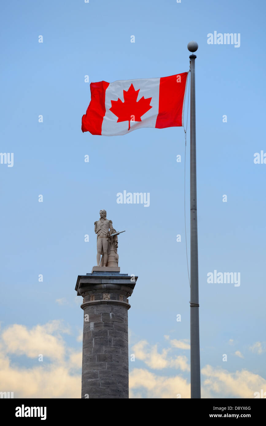 Montreal architecture with statue and Canada National Flag Stock Photo ...