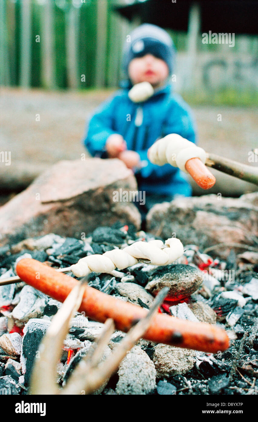 Child eating hot dog hi-res stock photography and images - Alamy