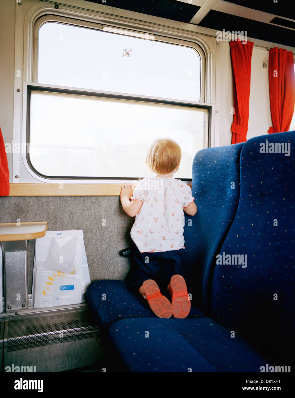 A small child on a train Stock Photo - Alamy
