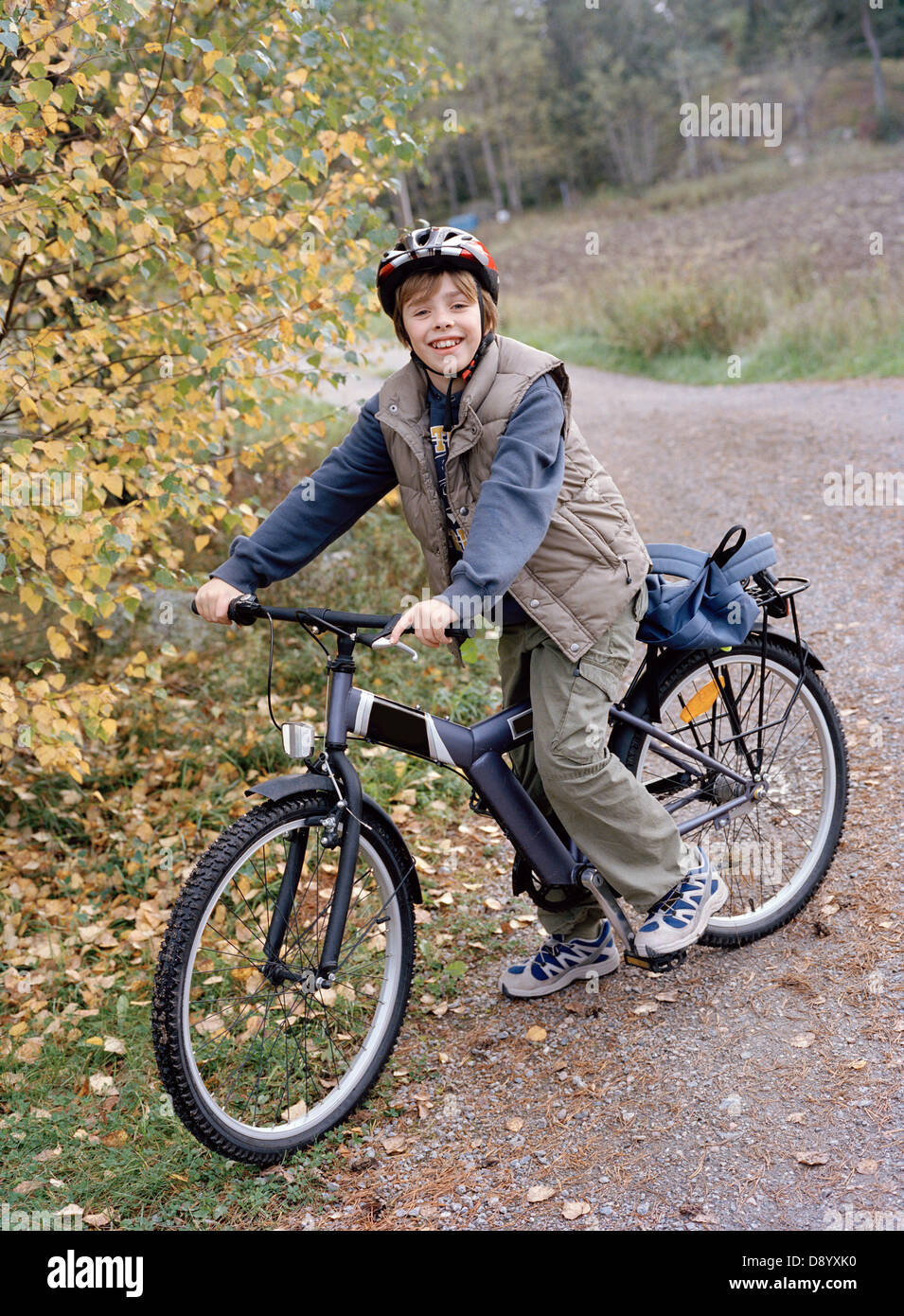 A boy with his bicycle Stock Photo - Alamy