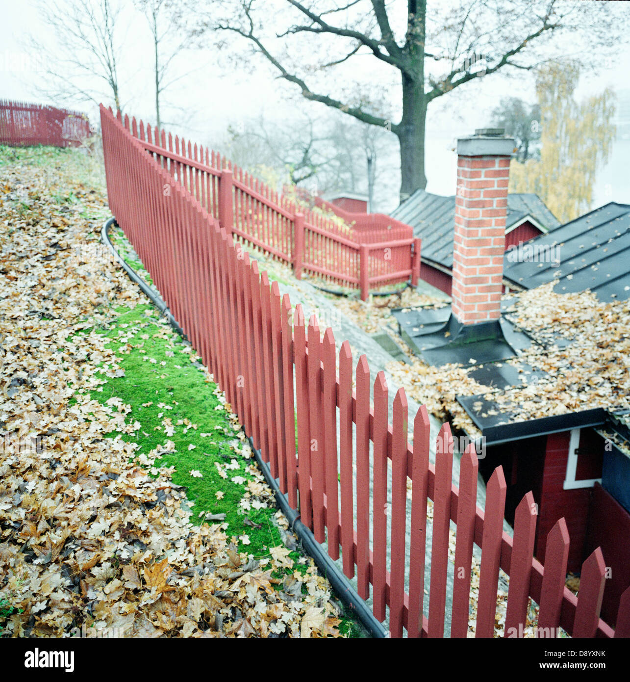 A red fence, Sweden Stock Photo - Alamy