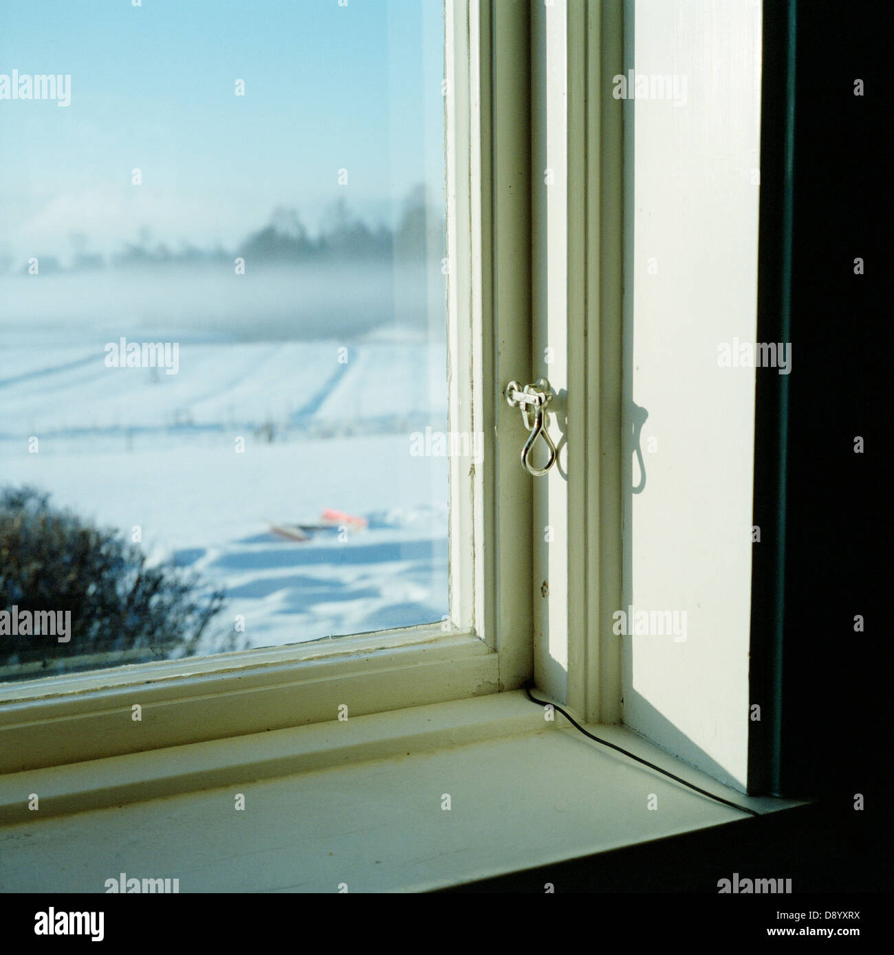 Wintry landscape through a window, Dalarna, Sweden Stock Photo - Alamy