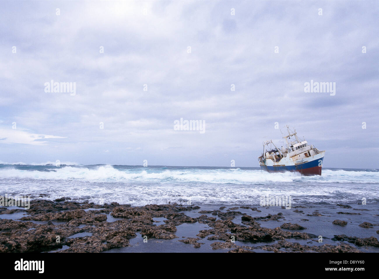 Ship run aground in the water`s edge Stock Photo - Alamy