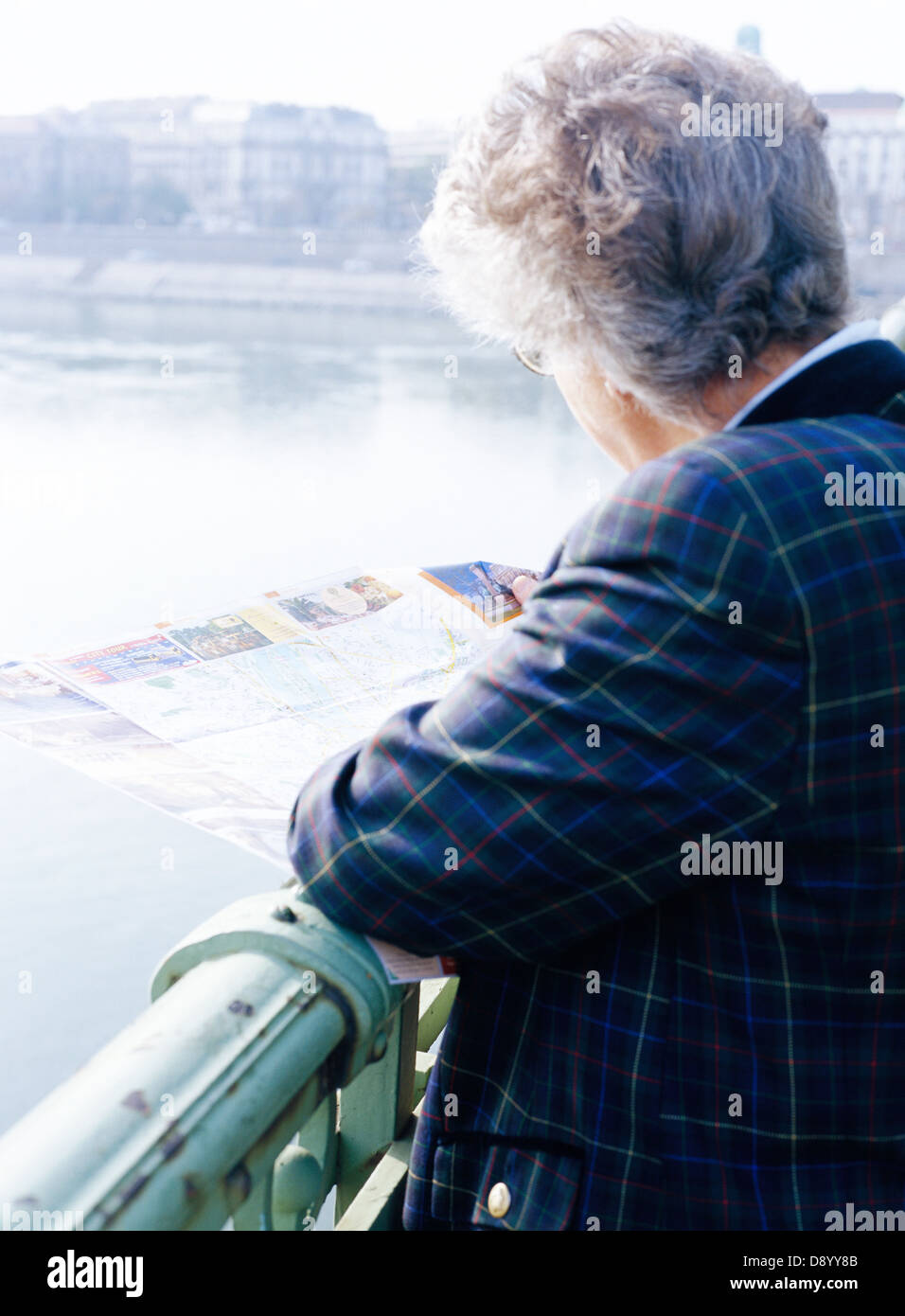 Old-age pensioner with a map Stock Photo - Alamy