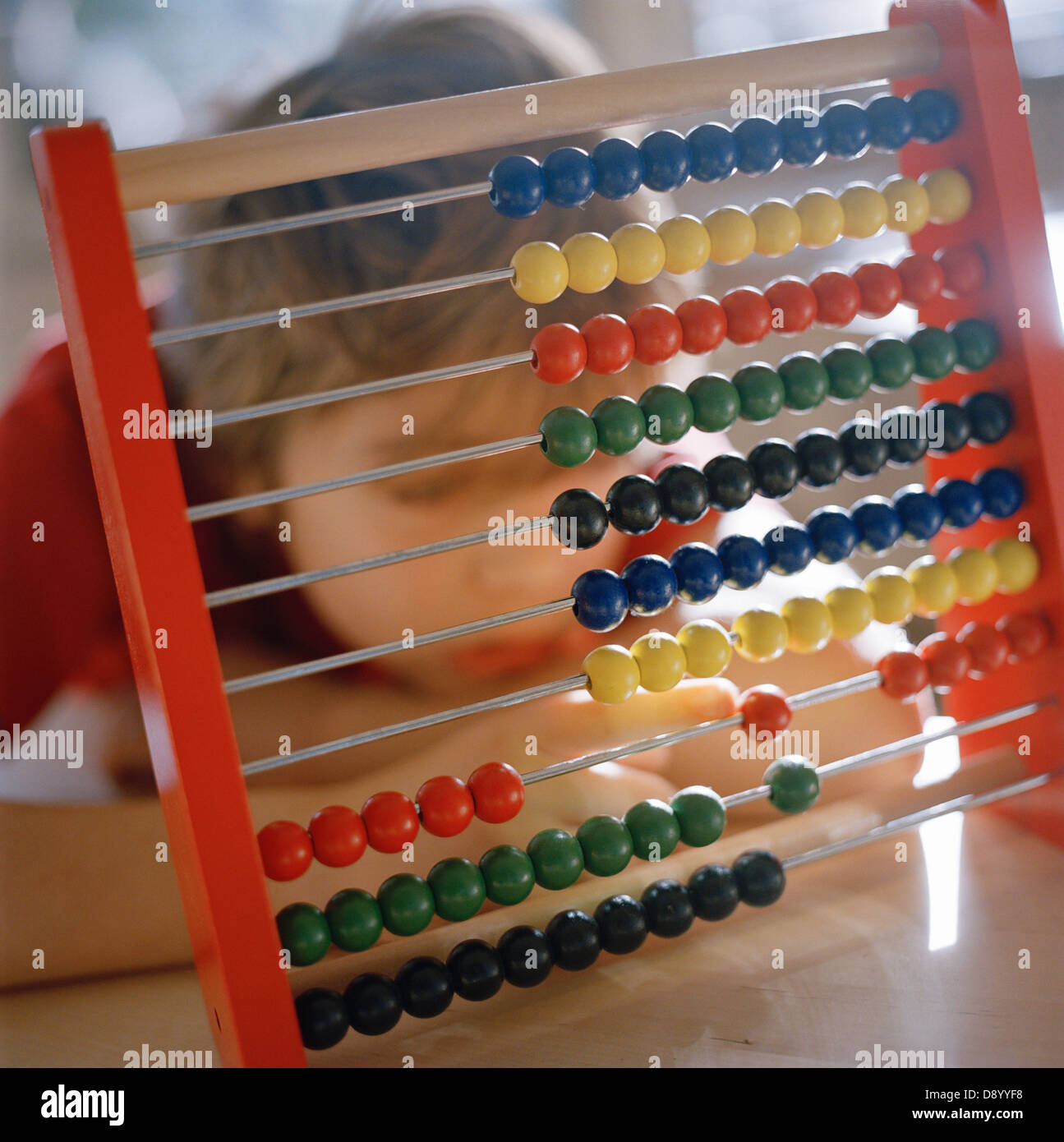 Boy using abacus Stock Photo - Alamy