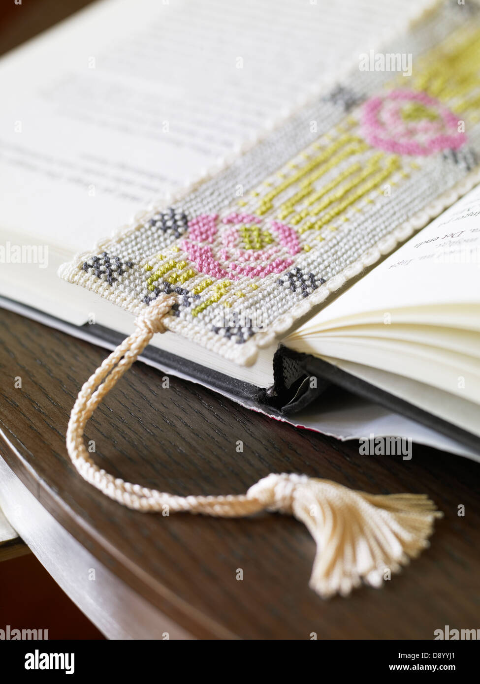 A bookmark in a book, close-up Stock Photo - Alamy