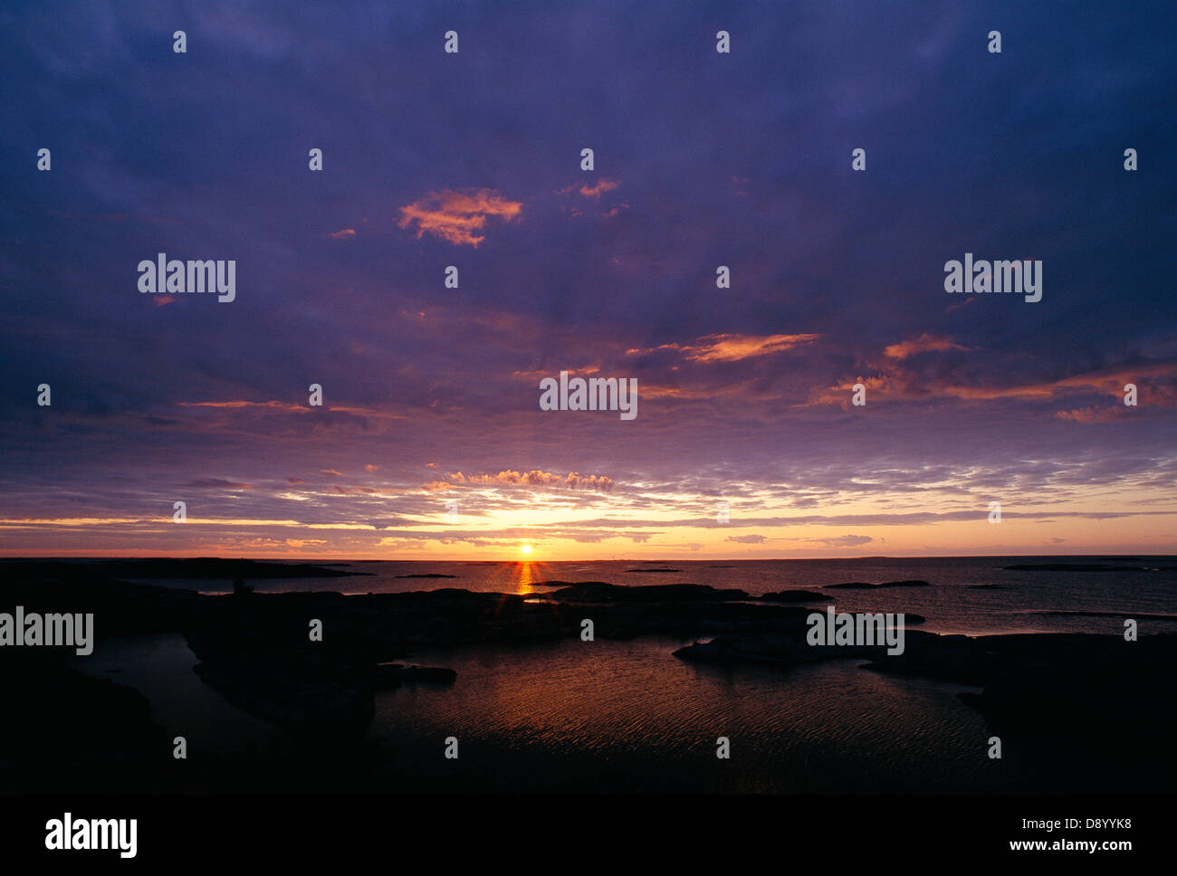 Sunset in the archipelago Stock Photo - Alamy