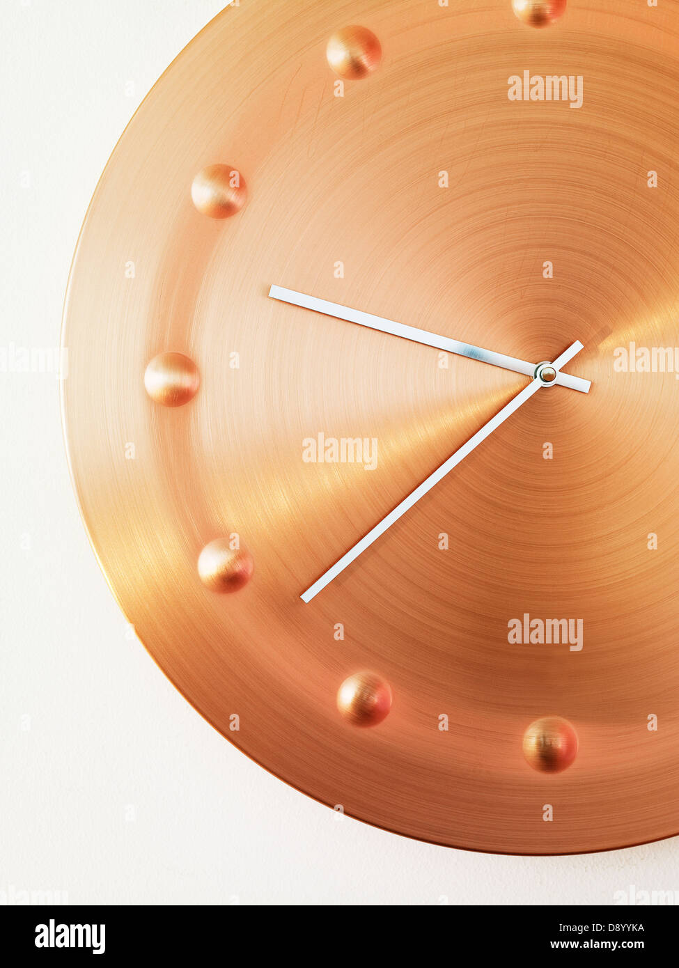 A clock on a wall Stock Photo - Alamy