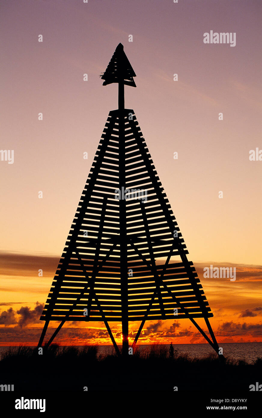 Navigation mark in the sunset Stock Photo - Alamy