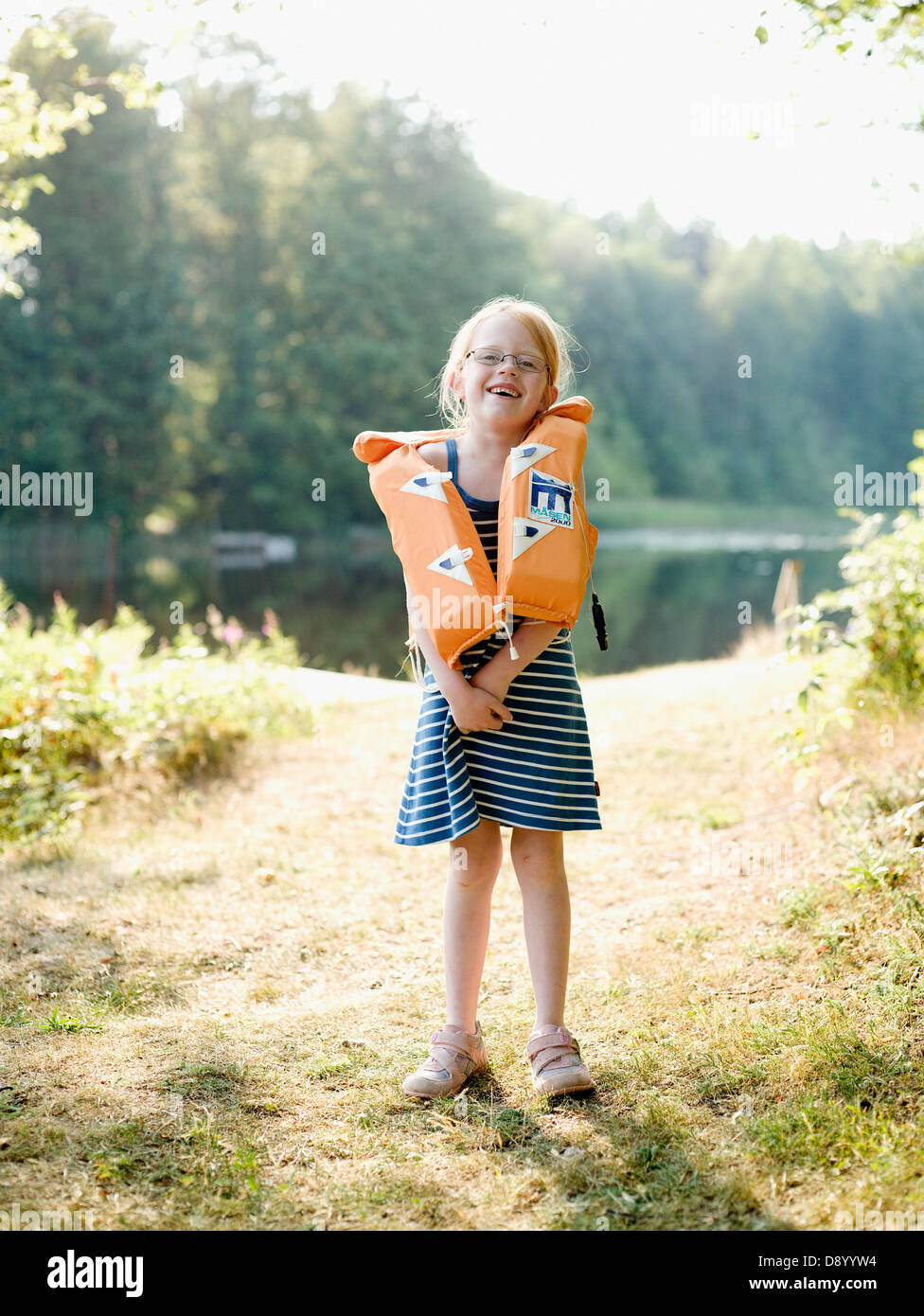 Portrait of a girl with a life jacket Stock Photo - Alamy