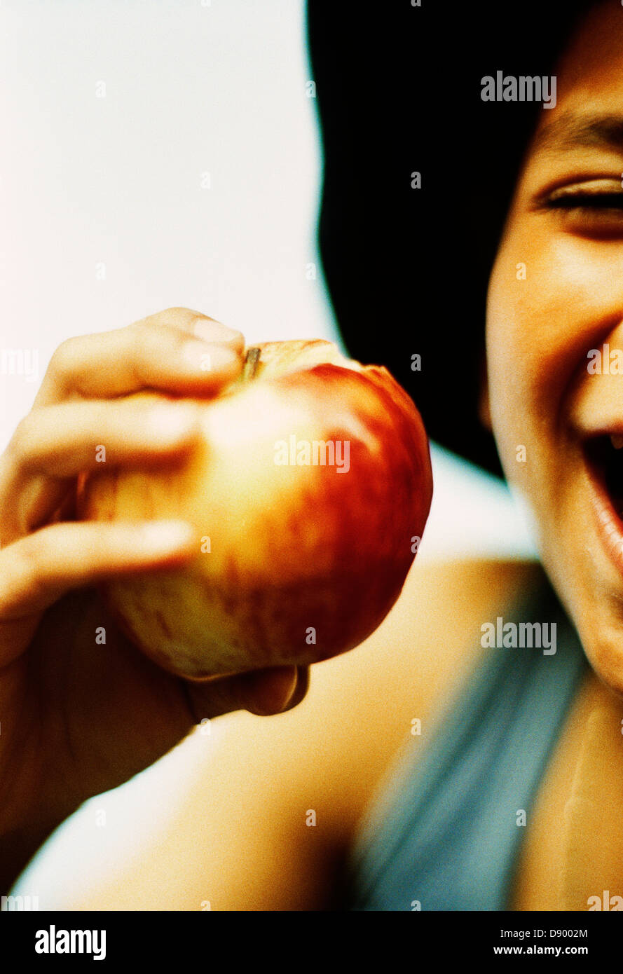 A boy eating an apple, Sweden Stock Photo - Alamy