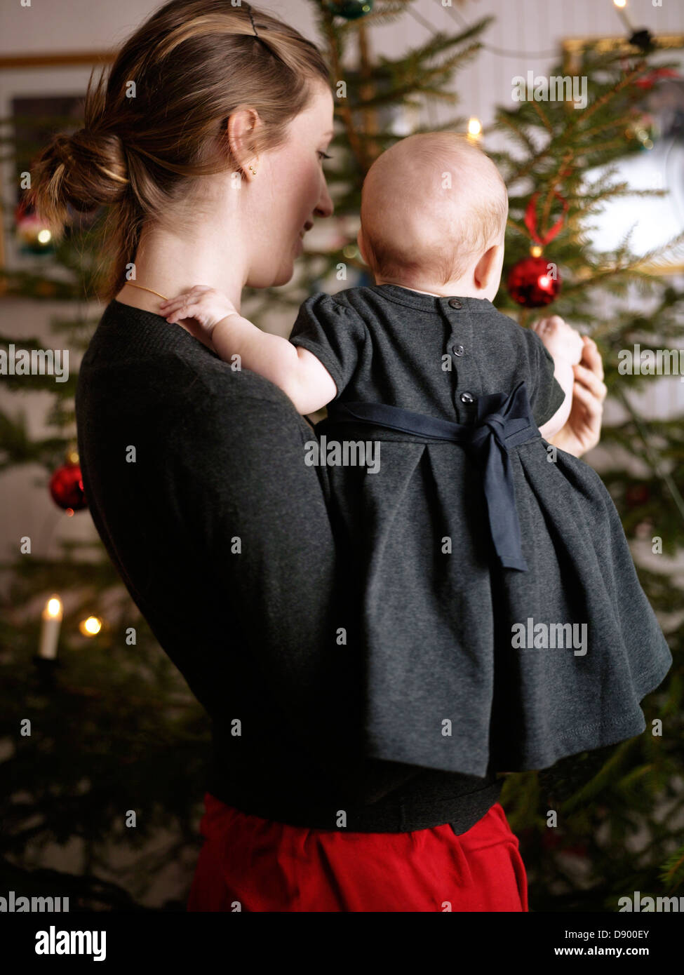 Women admiring a child hi-res stock photography and images - Alamy