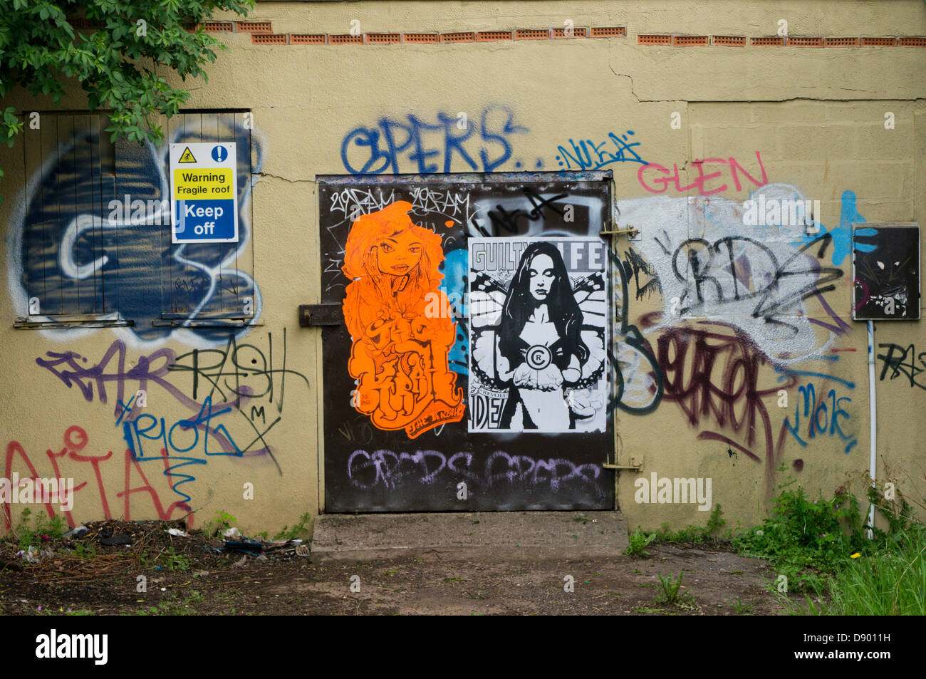 A graffiti covered wall Stock Photo - Alamy