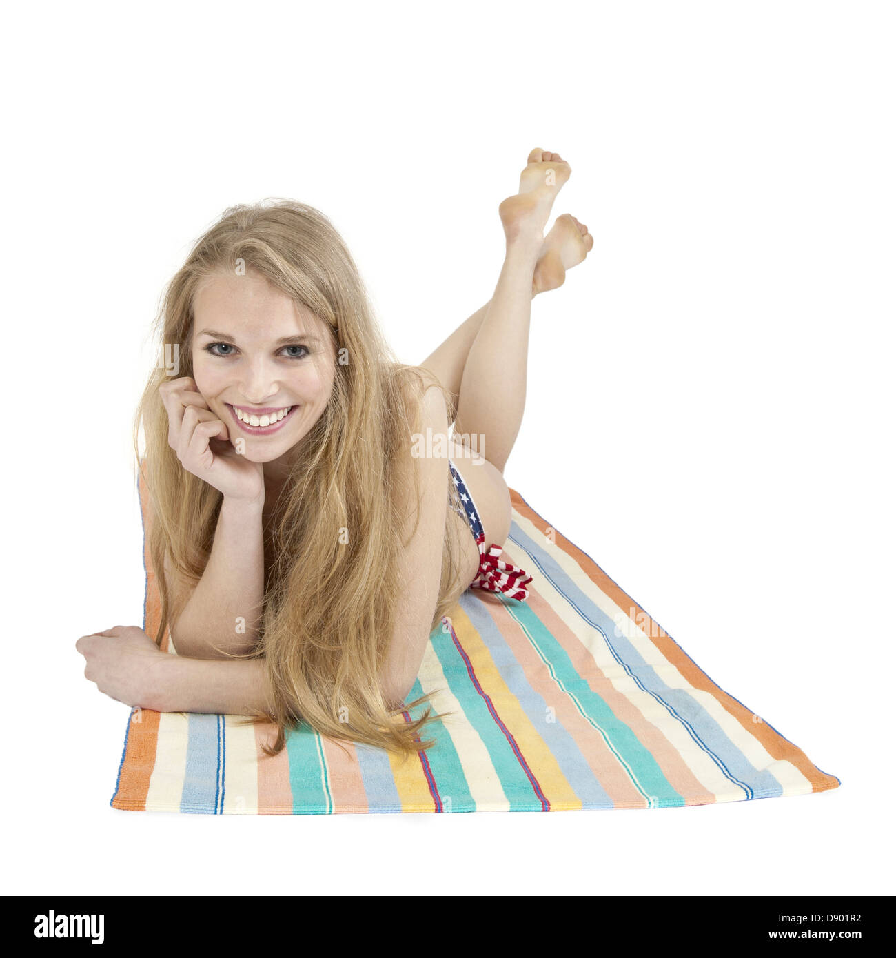 Woman lying sunbathing on beach Cut Out Stock Images & Pictures - Alamy