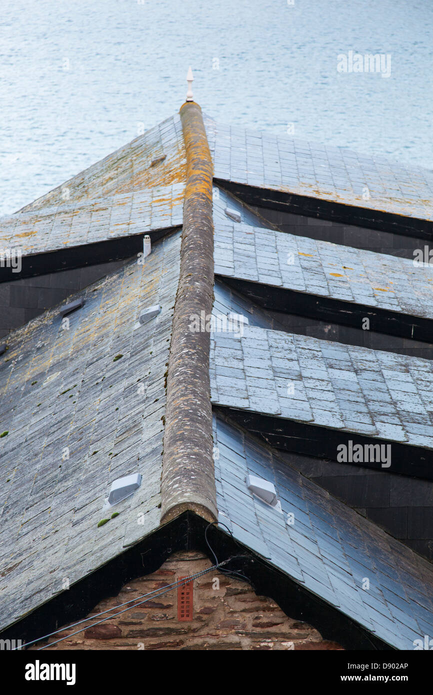 View along a roof ridge with different pitches and angles forming ...