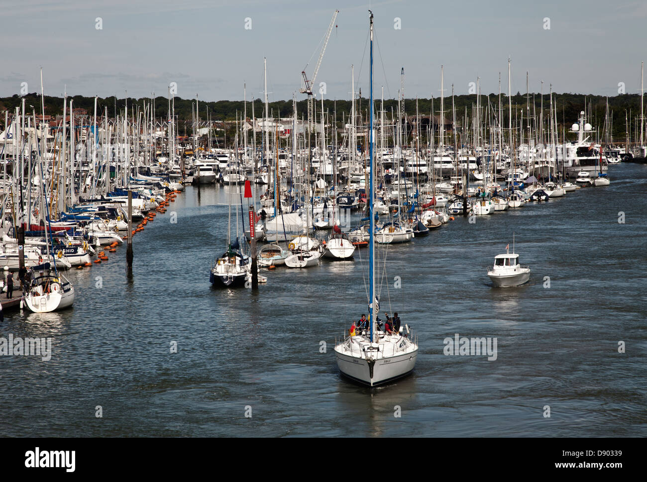 Yacht heading from Lymington harbour towards the Solent Stock Photo - Alamy