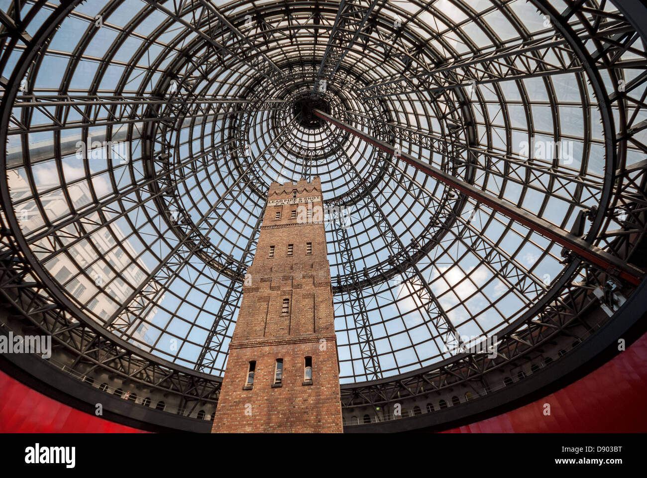 The architectural glass and steel spire over the historic Shot Tower in ...