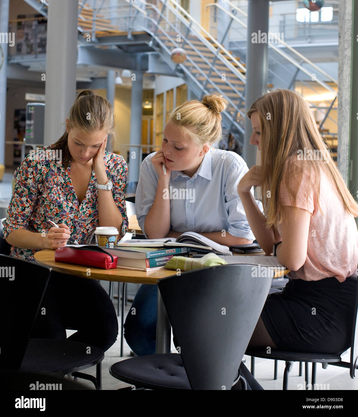 University students studying in cafe Stock Photo - Alamy