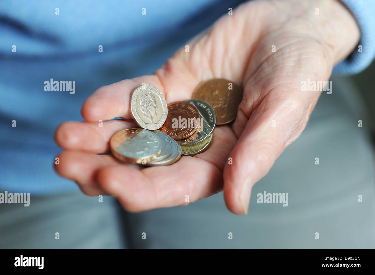 Elderly caucasian woman sorting out her money Stock Photo - Alamy