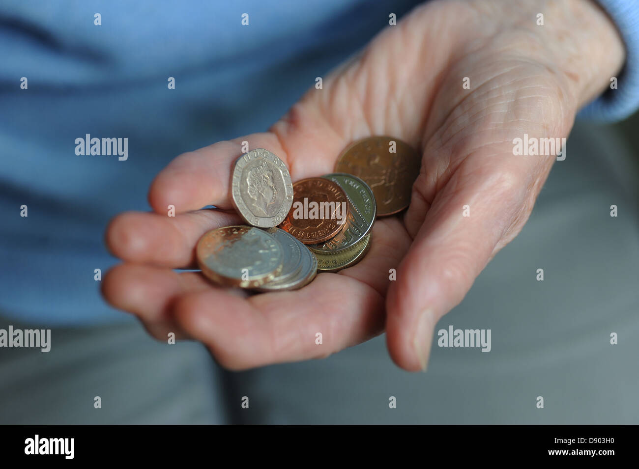 Elderly caucasian woman sorting out her money Stock Photo - Alamy