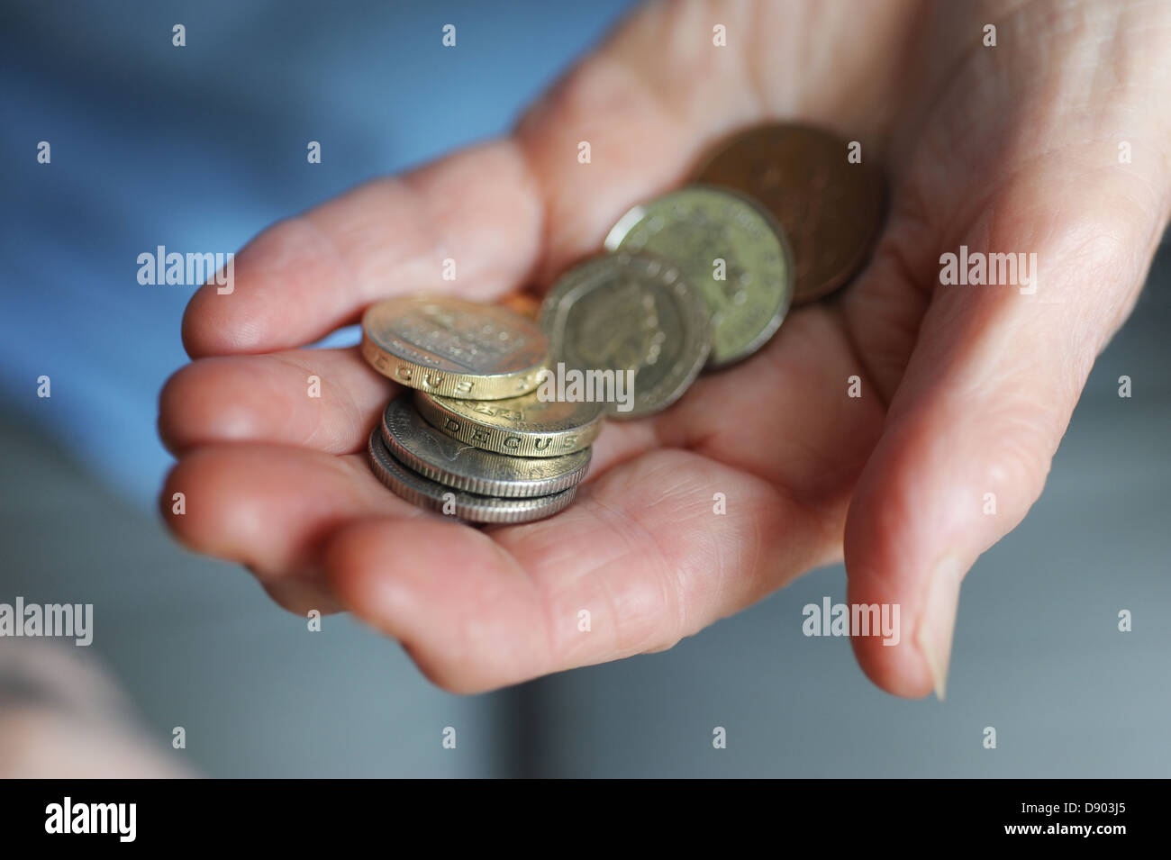 Elderly caucasian woman sorting out her money Stock Photo - Alamy