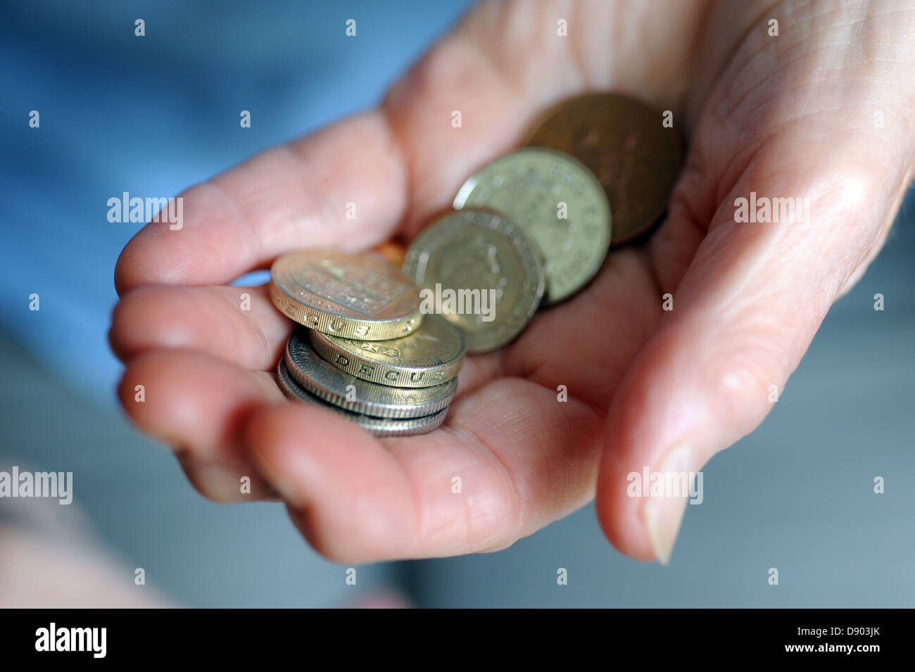 Elderly caucasian woman sorting out her money Stock Photo - Alamy