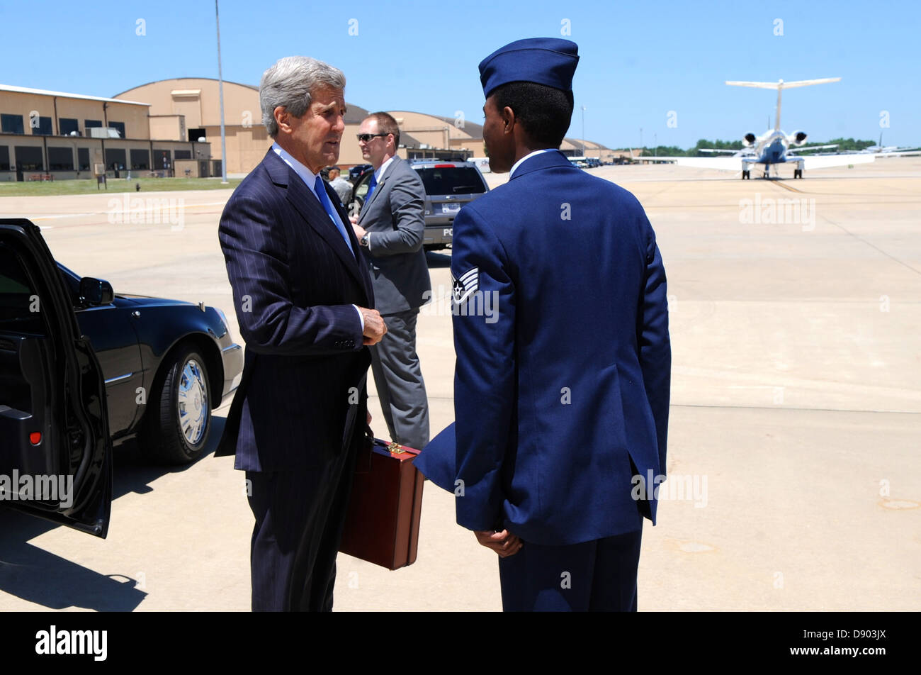 Secretary Kerry Greets a U.S. Air Force Protocol Officer Stock Photo ...