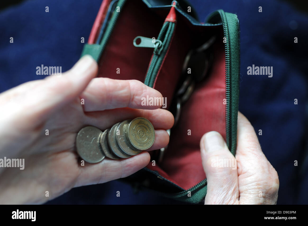 Hand sorting coins hi-res stock photography and images - Alamy