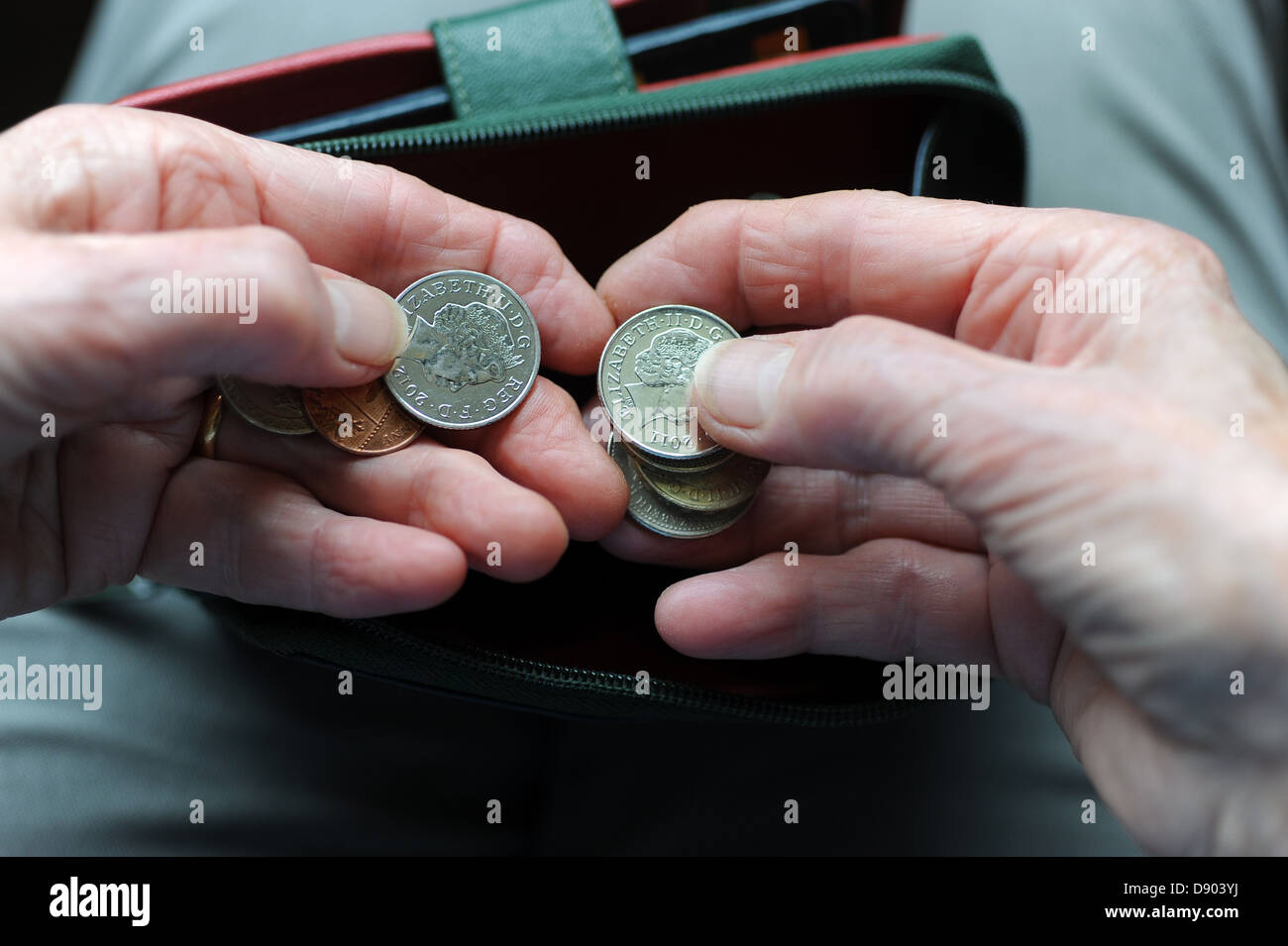 Elderly caucasian woman sorting out her money Stock Photo - Alamy