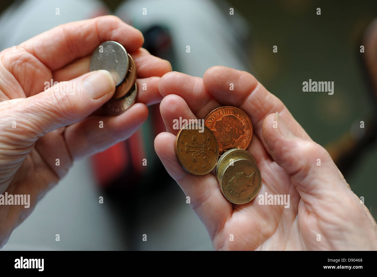 Elderly caucasian woman sorting out her money Stock Photo - Alamy