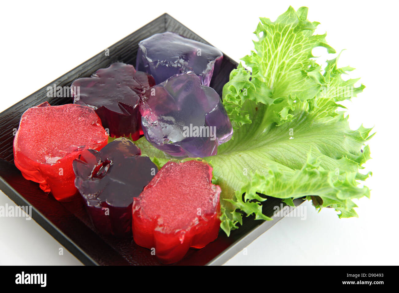 Red jelly and purple jelly in dish on the white background Stock Photo ...