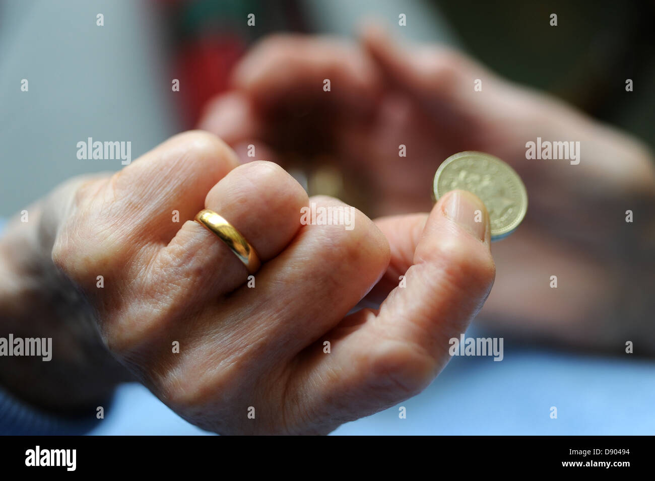 Elderly caucasian woman sorting out her money Stock Photo - Alamy
