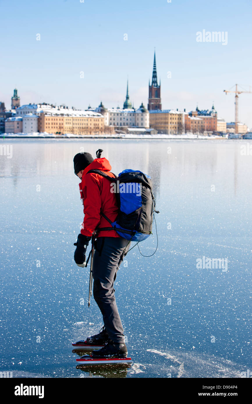 Man ice skating Stock Photo - Alamy