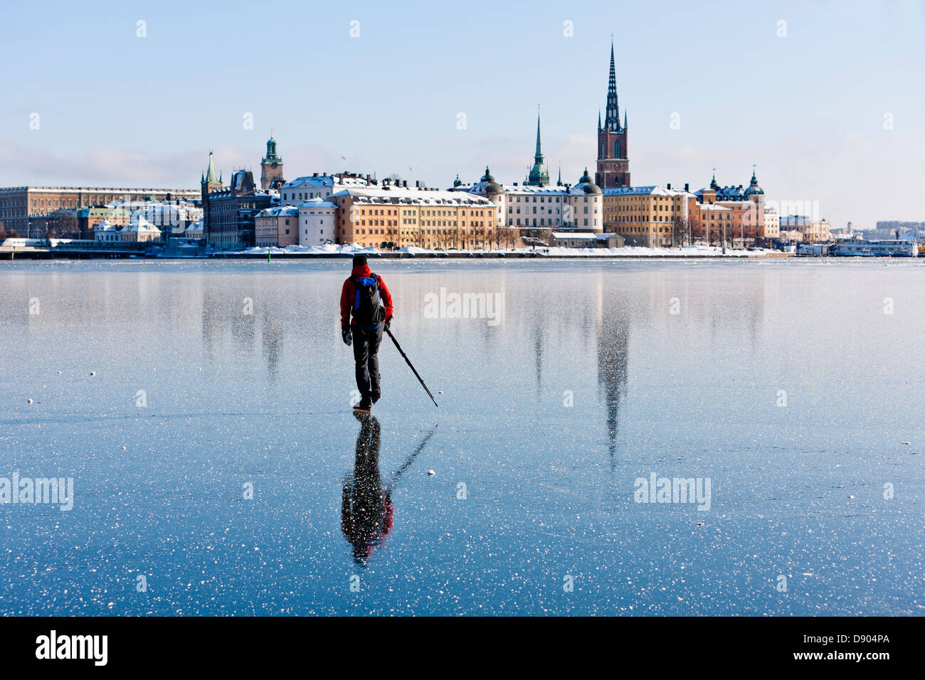 Man ice skating Stock Photo - Alamy