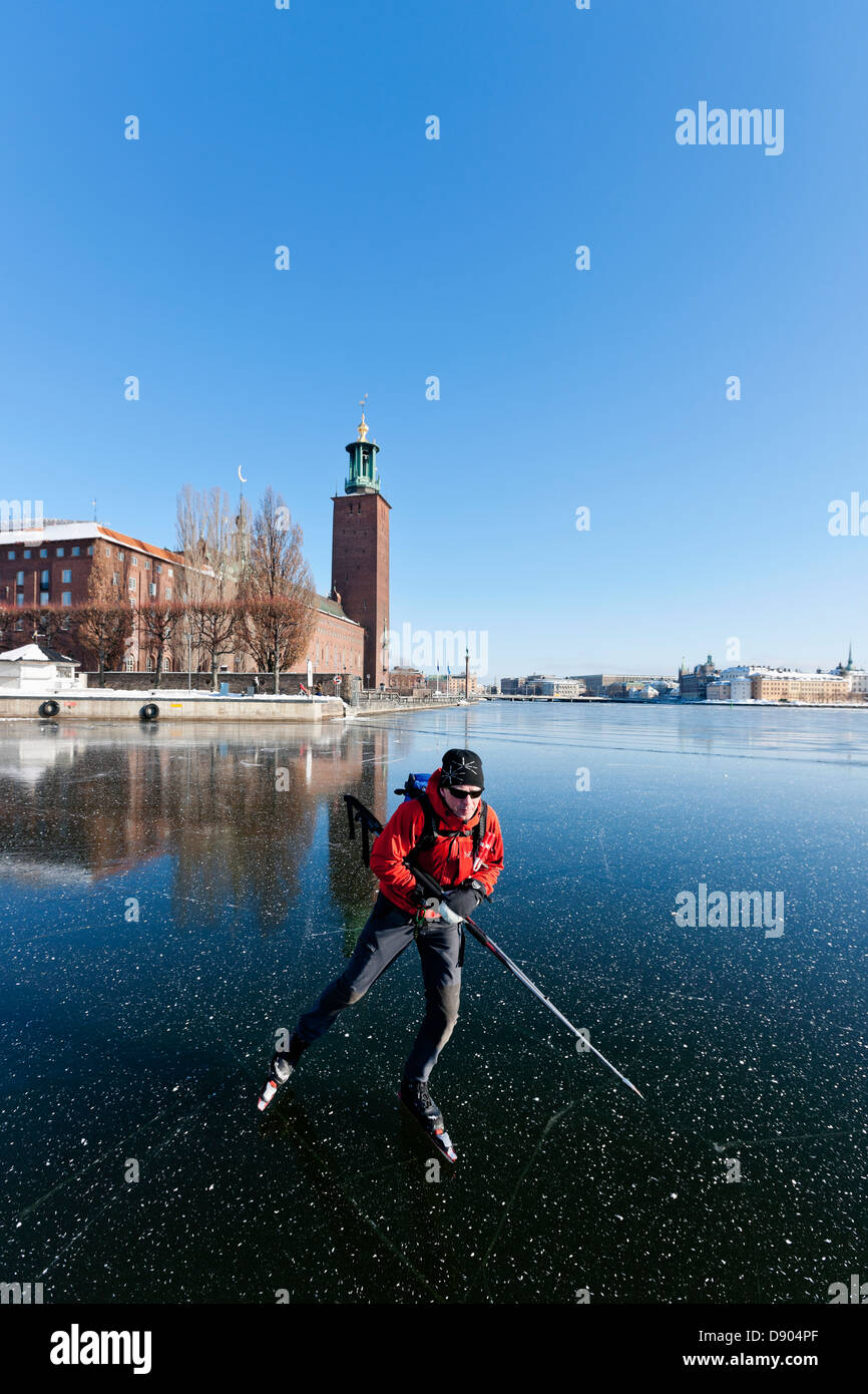 Man ice skating Stock Photo - Alamy