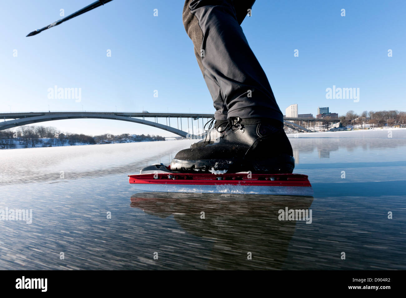 Man ice skating, low section Stock Photo - Alamy