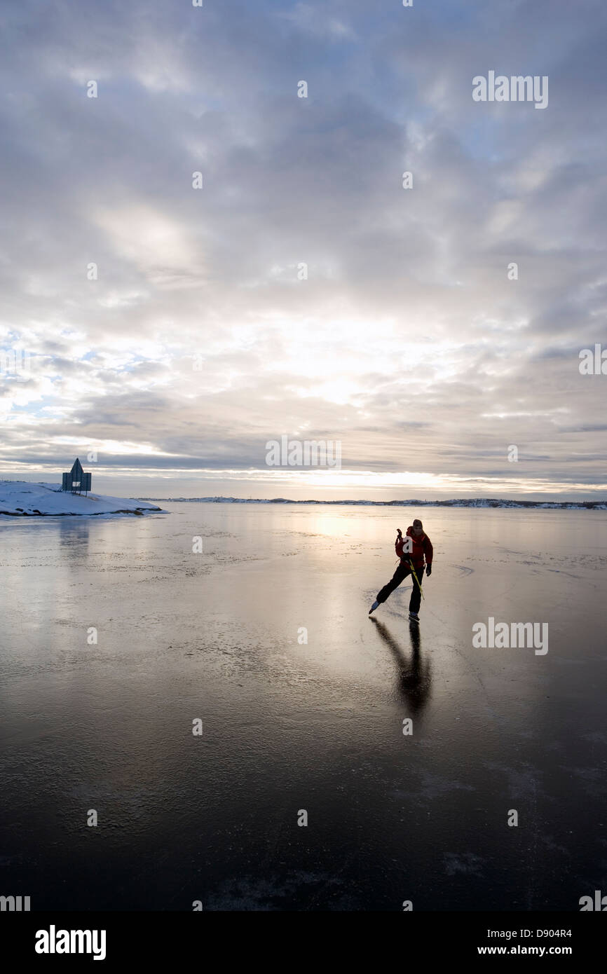 Skating on calm ice Stock Photo - Alamy