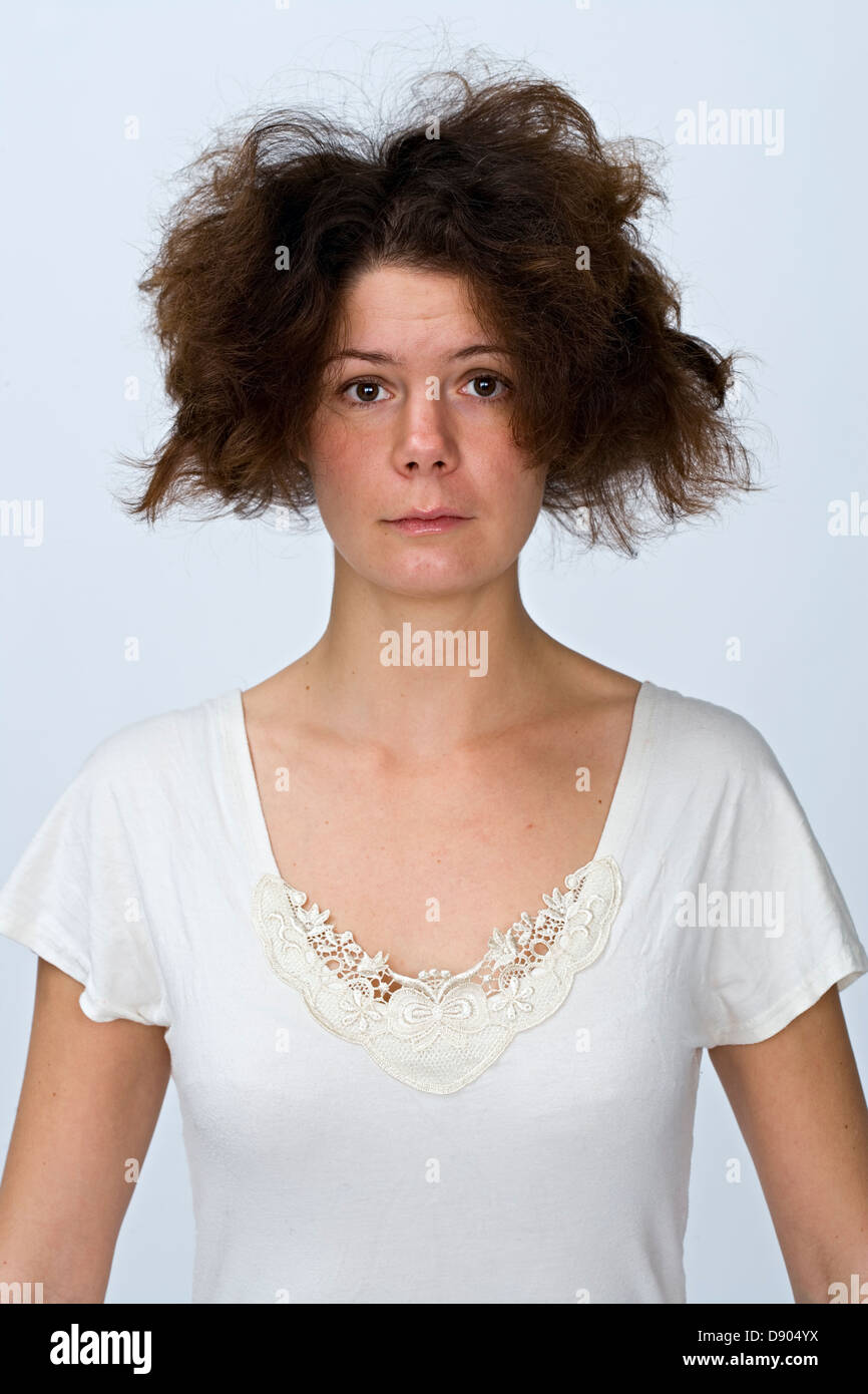 Portrait of a woman with messy hair Stock Photo - Alamy