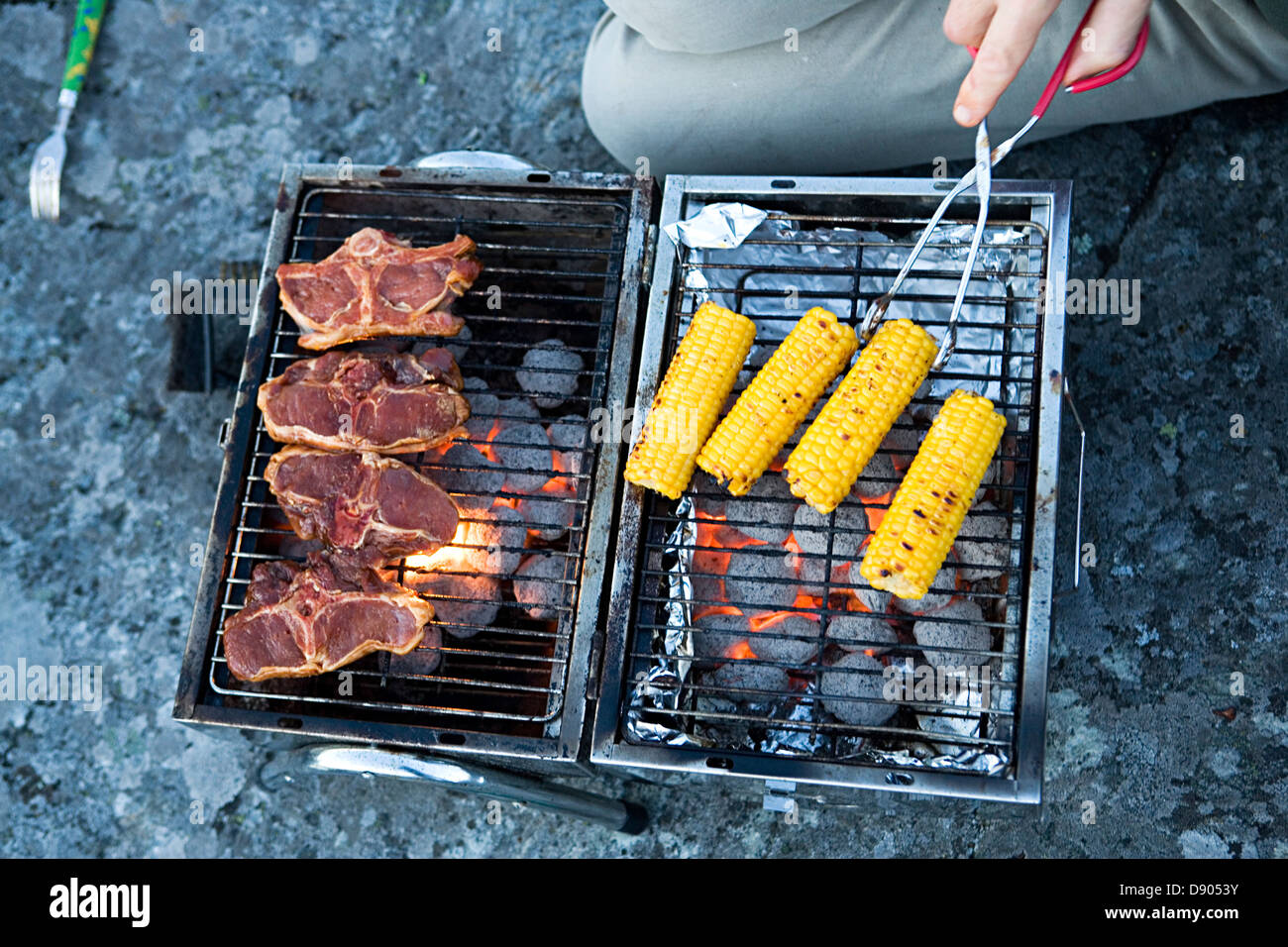 Barbecueing hi-res stock photography and images - Alamy